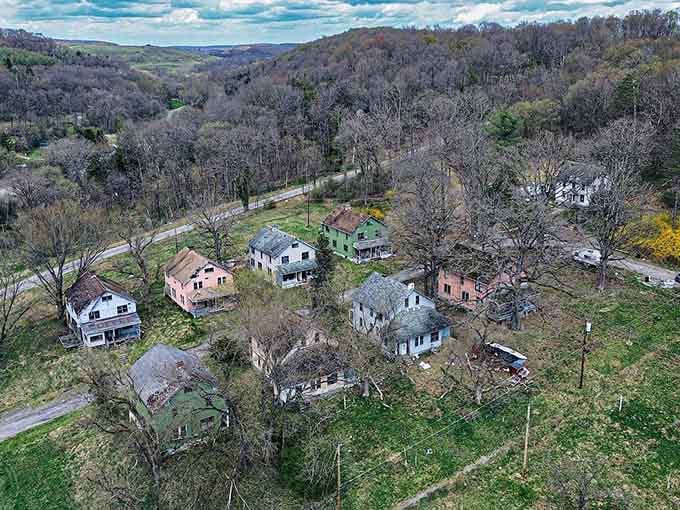 From above, you can see how the forest is slowly swallowing this forgotten community, one vine at a time.