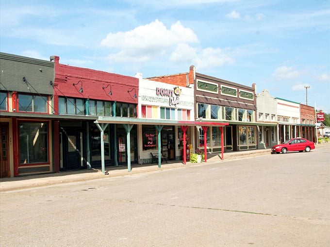 Colorful storefronts stand shoulder to shoulder, each one family-owned and filled with folks who remember your name.