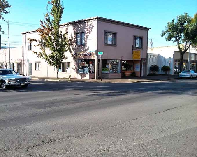 Simple storefronts on a quiet corner prove that authentic small-town Oregon still exists beyond the tourist brochures.