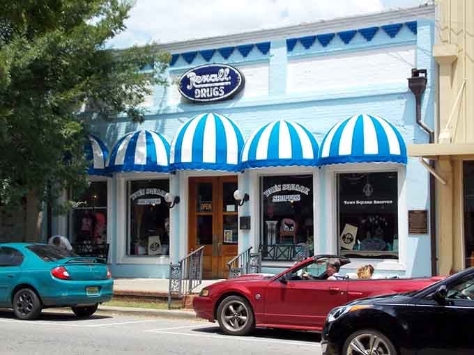 Those cheerful blue-and-white striped awnings at Town Square Shoppes practically beg you to come browse and stay awhile.