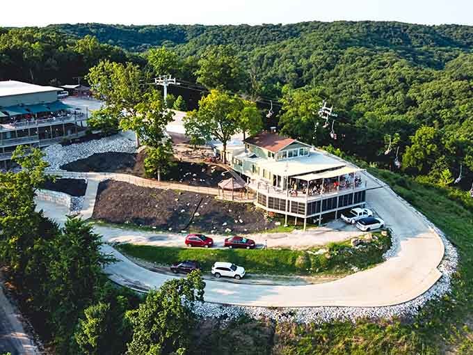 From above, the resort nestles into the bluffs like it's always belonged among these ancient river valleys.