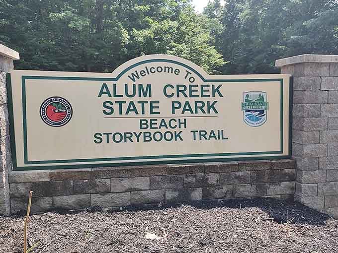 This welcoming sign marks the gateway to Ohio's largest inland beach, where landlocked dreams of coastal escapes come true.