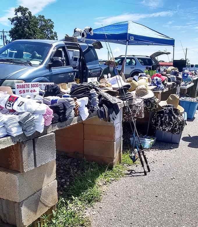 Socks and hats overflow from a vehicle-turned-booth, proving that at flea markets, your car is also your storefront and warehouse.