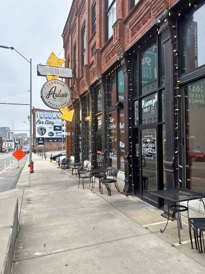 The inviting exterior with outdoor seating beckons passersby to discover what treasures await inside this Columbus Park gem.