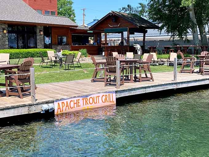 Adirondack chairs on the dock invite you to linger with a drink while boats drift lazily past.