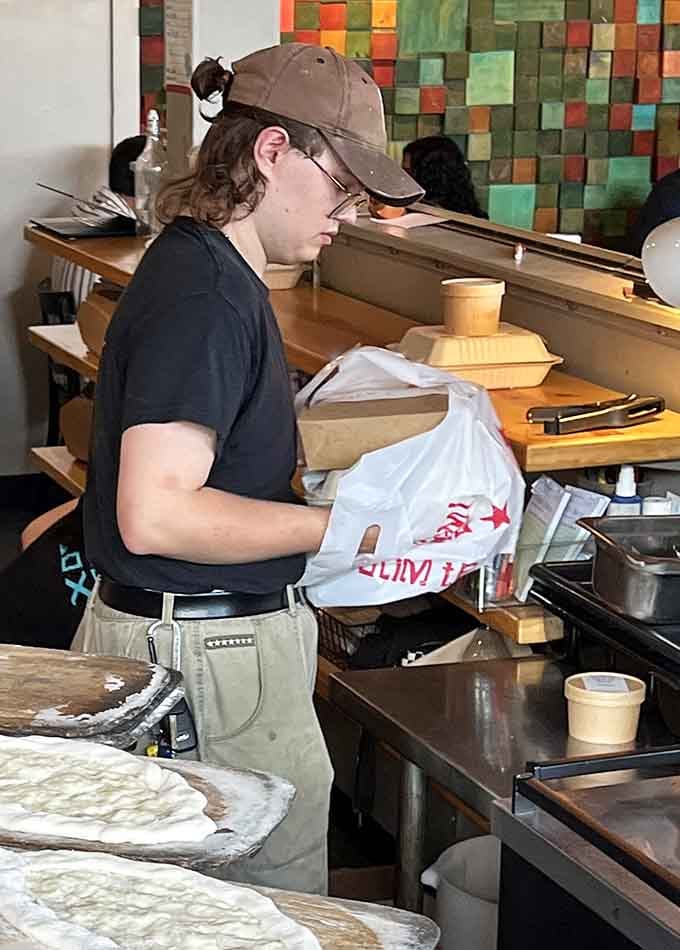 Behind the scenes, dedicated staff work their magic, turning simple ingredients into the kind of meals that create lifelong fans.