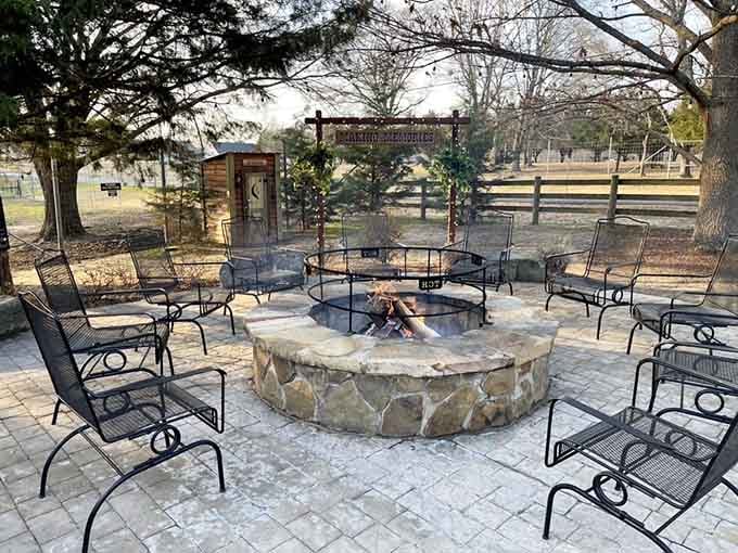 The outdoor fire pit area offers the perfect spot for gathering before or after your meal and animal encounters.