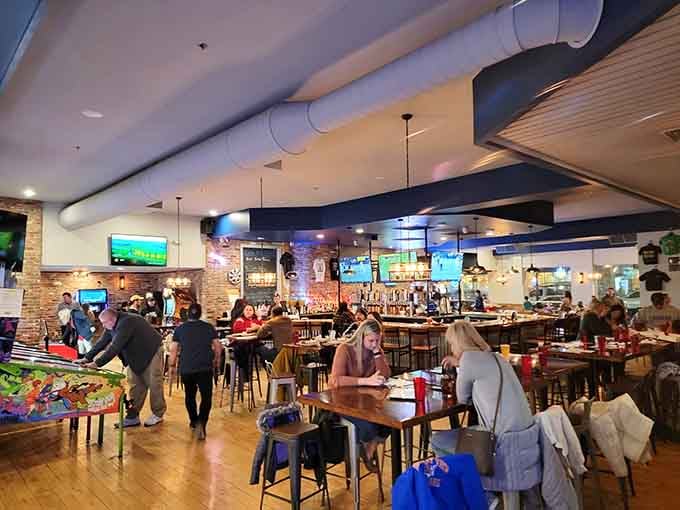 Happy customers enjoying the perfect combination of food, drinks, and games that makes Bartari truly special.