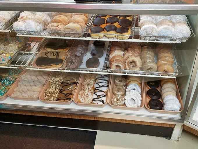 The donut display case where choosing just one feels like an impossible task designed to test your character.