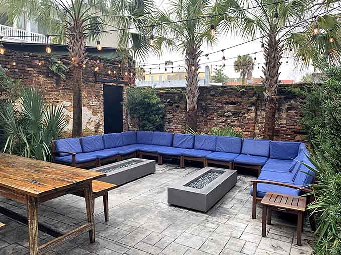 Blue cushions and fire pits make this courtyard lounge the kind of hidden gem that locals guard like a secret.