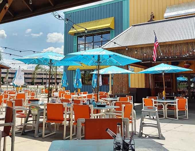 Bright umbrellas and colorful seating transform a Wisconsin patio into your own personal Caribbean getaway.