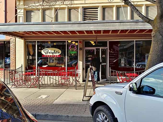 That cheerful storefront on Main Street practically winks at you, daring you to walk past without stopping inside.