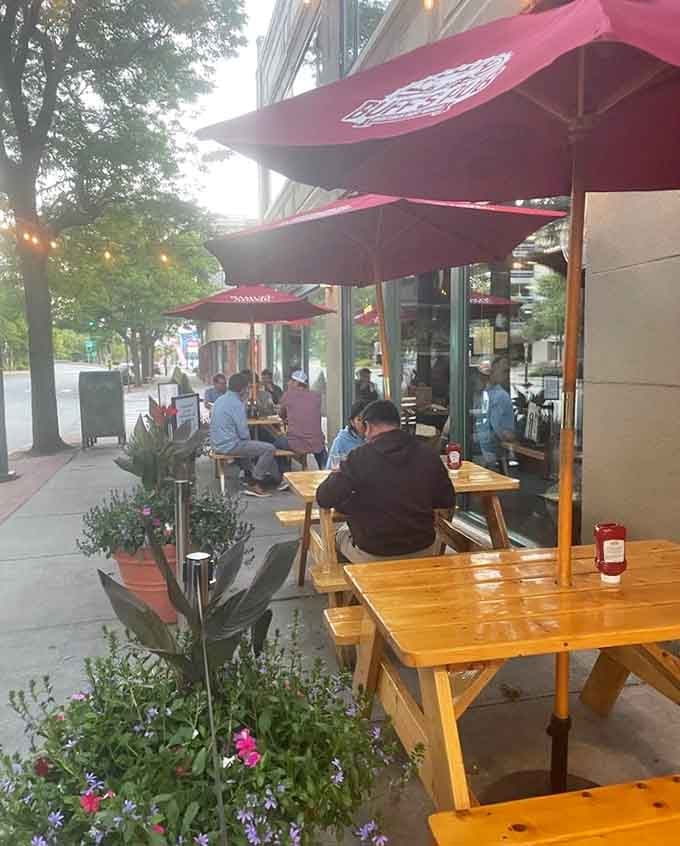 Outdoor seating extends the fun to the sidewalk, perfect for people-watching while tackling your wing order.