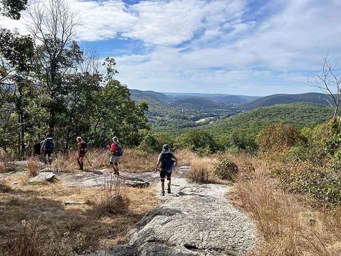 Sharing the summit with fellow adventurers creates an instant bond only mountain-climbers truly understand and appreciate.