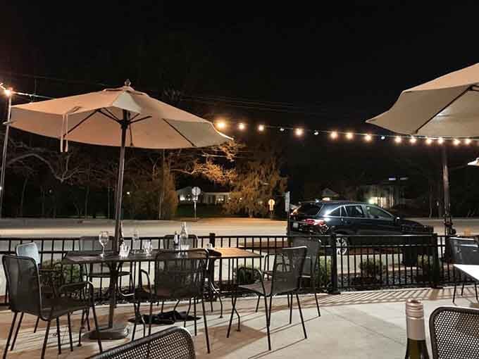 String lights and outdoor seating create the perfect ambiance for enjoying pizza under the Kentucky stars.