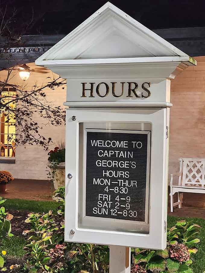 Operating hours posted clearly so you can plan your seafood strategy for any day of the week.