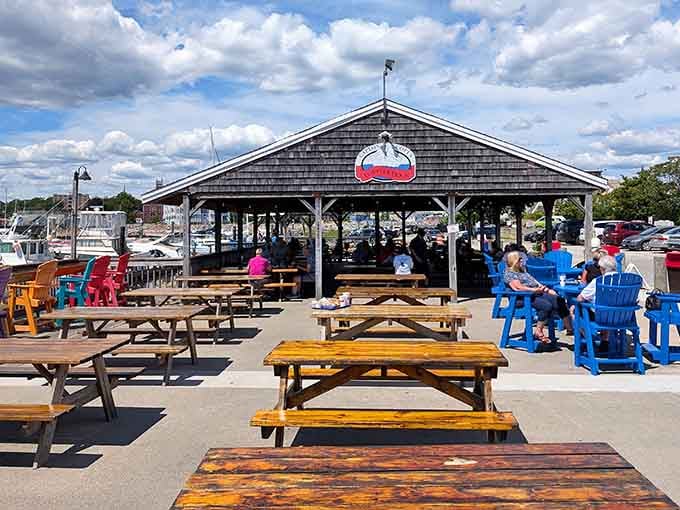Picnic tables and open-air dining under a pavilion, because fancy restaurants can't compete with eating seafood by actual water.