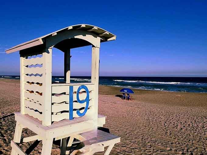 Lifeguard stands stand sentinel over the shore, those reassuring symbols of safety that let parents actually relax on vacation.