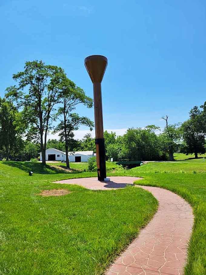 A giant golf tee waits patiently for someone to drive the world's largest ball straight down Main Street.