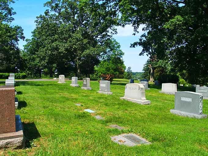 Summer's vibrant green grass frames these monuments beautifully, proving that life continues its eternal cycle around us.