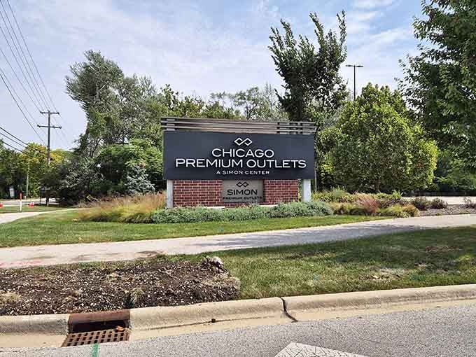 The entrance sign stands proud, marking the spot where sensible spending meets satisfying shopping in perfect suburban harmony.