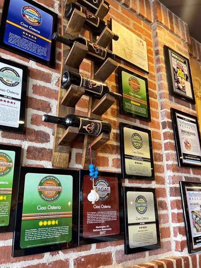 Awards and accolades covering the brick wall, proof that locals have been keeping this delicious secret to themselves.