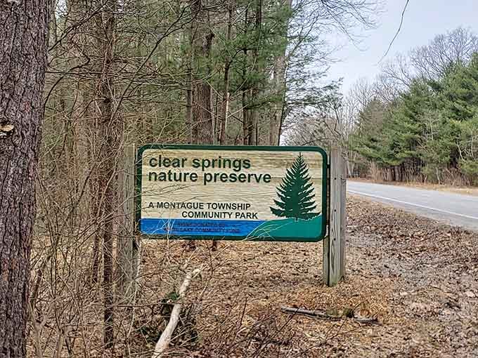 Simple signage marks the entrance to forty acres of pure Michigan natural beauty and tranquility.