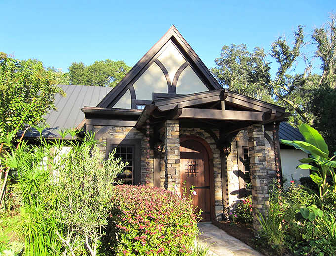 The charming exterior perfectly sets the stage for the transformative experience waiting inside those doors.