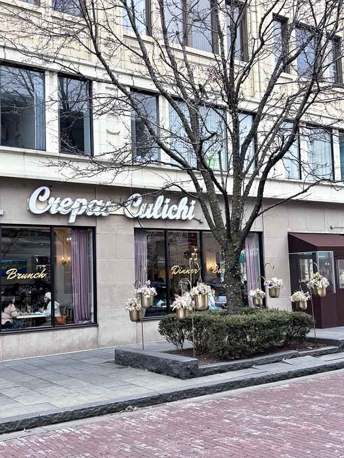 Corner location with those planters looking like the kind of place you drive past twice before finding parking.