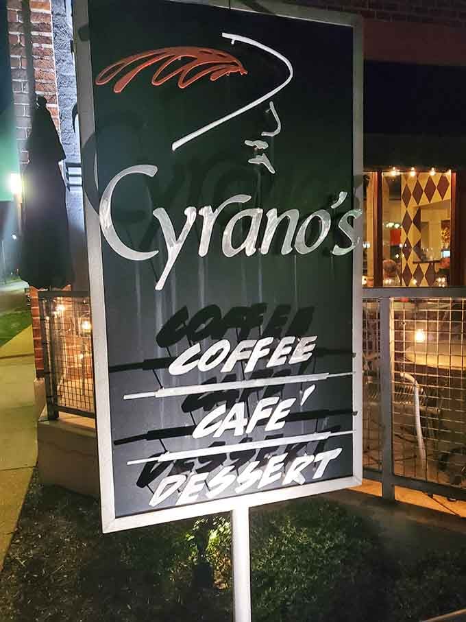 The Cyrano's sign beckons with promises of coffee, cafe fare, and desserts worth canceling other plans.
