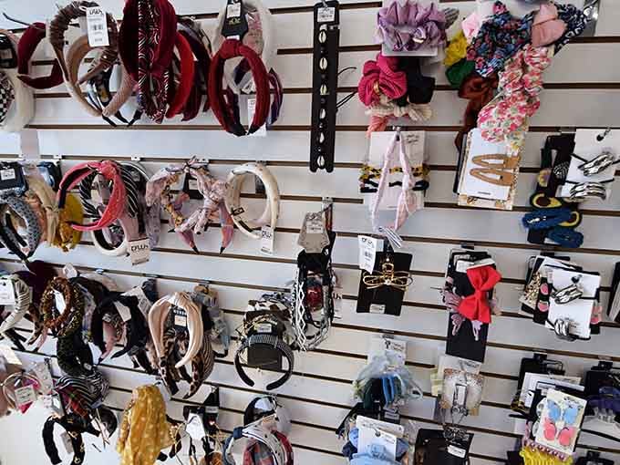 Hair accessories create a playful wall of possibilities, from practical headbands to statement pieces that sparkle brightly.