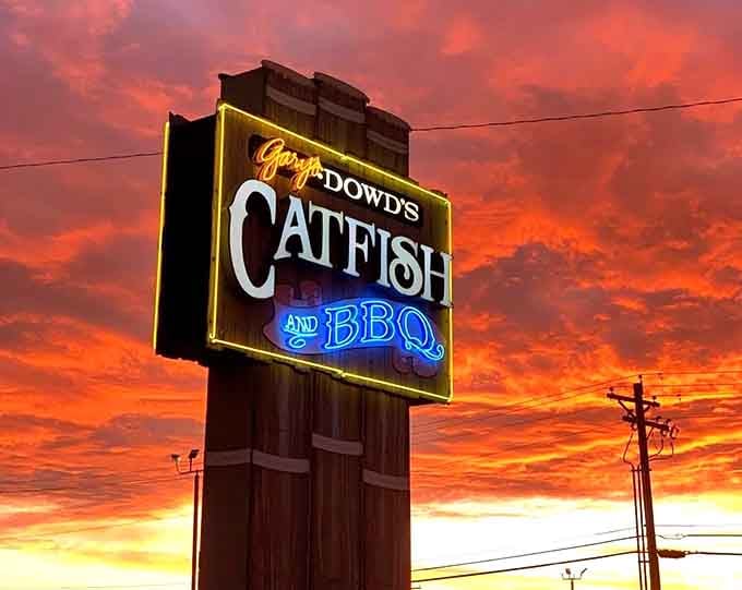 When the sky puts on a show like this behind your sign, you know the universe approves of fried catfish.
