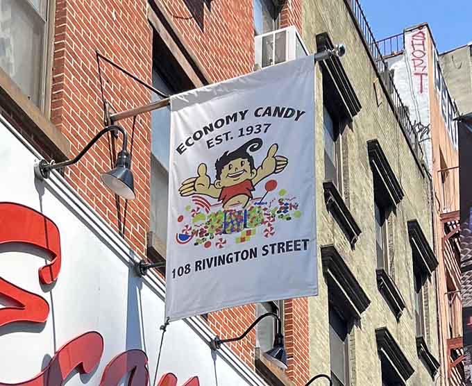 The banner proudly announces this sweet institution's address like a beacon guiding sugar pilgrims home at last.