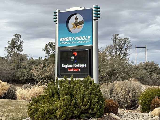The university's eagle logo soars proudly, welcoming visitors to this world-class aviation education center.