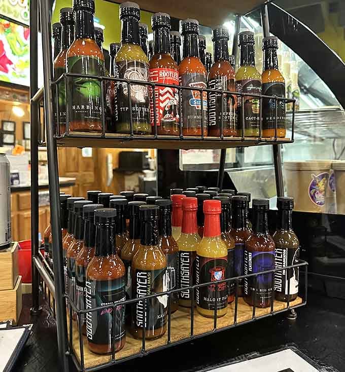 A hot sauce collection that would make any spice enthusiast weep tears of joy and capsaicin.