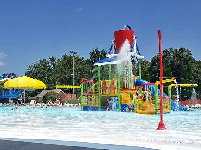 The towering structure stands ready to deliver squeals of delight, one bucket dump and slide ride at a time.