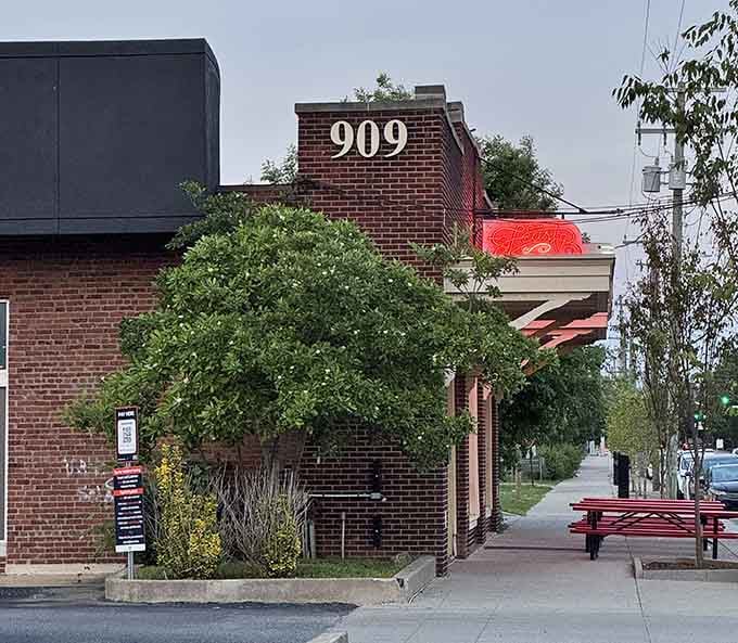 The brick building at 909 has seen Louisville change and grow, now serving up modern barbecue classics.