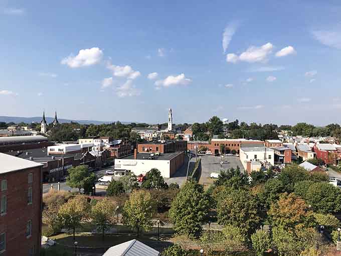 Church spires punctuate the skyline of a town that's mastered the art of staying authentically itself.