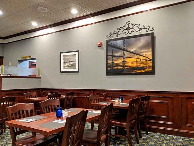 The main dining area awaits your arrival, tables set and ready for the steakhouse experience you deserve.
