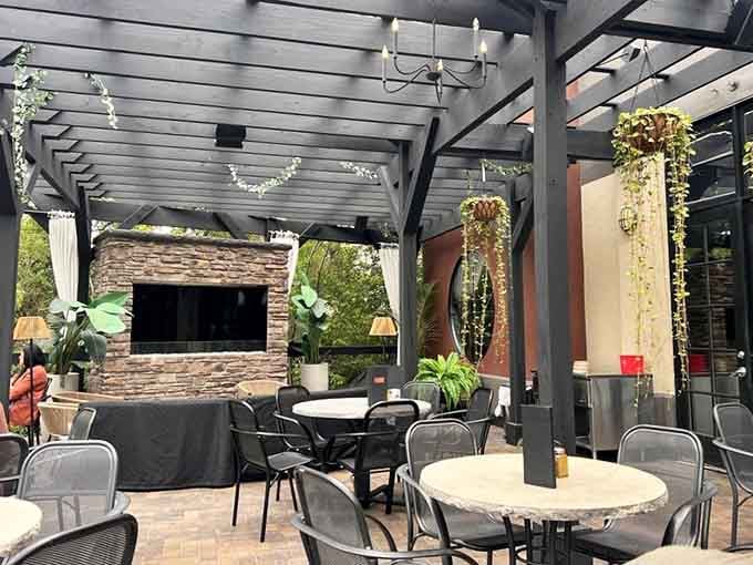 The outdoor patio offers a sophisticated space for warm-weather dining under string lights and Minnesota's beautiful summer skies.