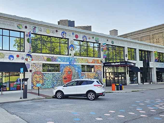 The cheerful facade beckons from Monroe Center, promising air-conditioned relief and adventures that'll exhaust your energetic grandkids beautifully.