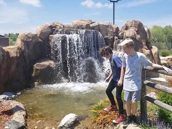 This waterfall feature adds natural beauty to the outdoor area, proving the FunPlex delivers scenery alongside the thrills.