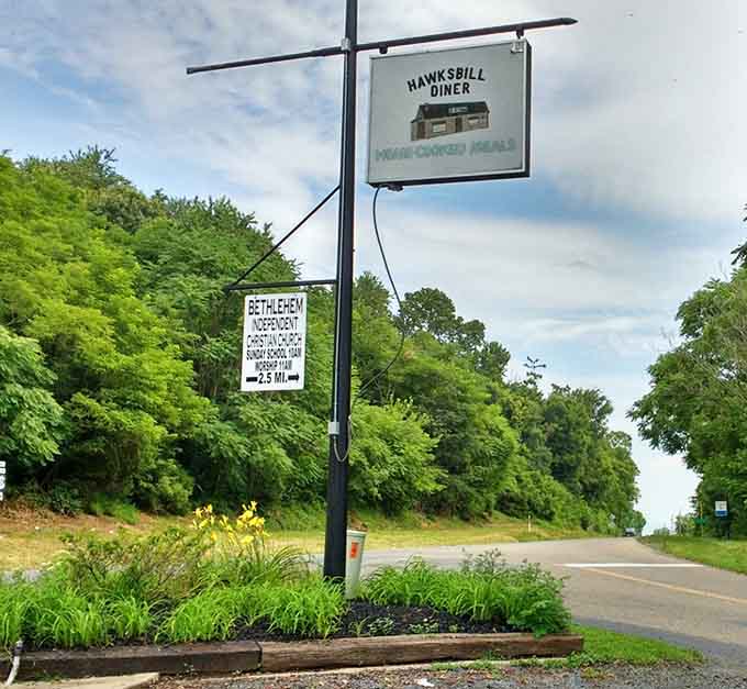 That roadside sign might be simple, but it marks the spot where breakfast pilgrims find exactly what they're seeking.