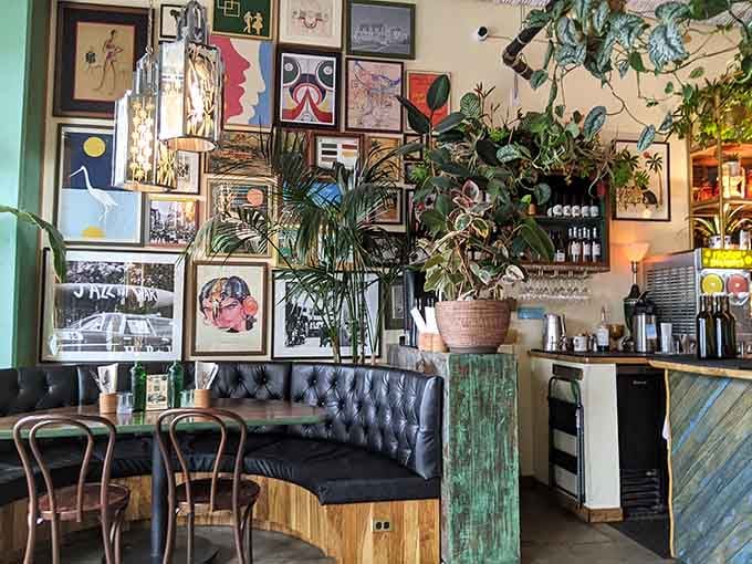 Gallery walls meet tufted booths in a space where every corner tells its own story.