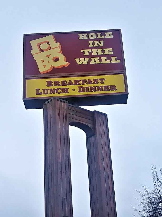 The classic roadside sign promising breakfast, lunch, and dinner is your beacon to authentic smoked meat heaven.