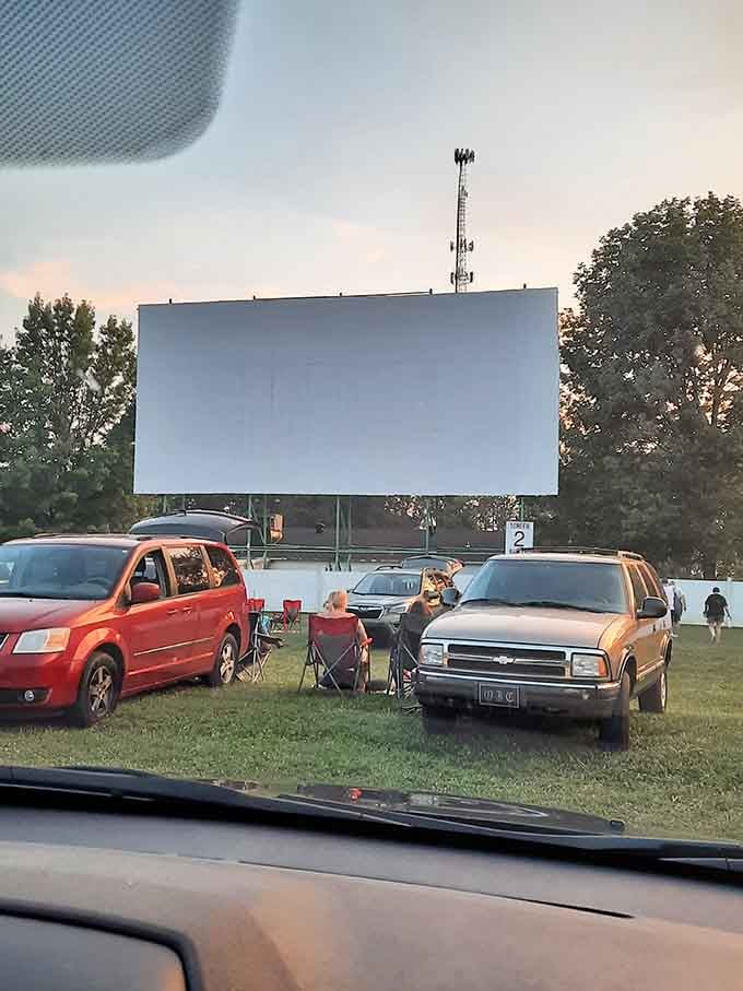 Settling in as dusk approaches, your dashboard view frames the screen perfectly for the upcoming double feature.