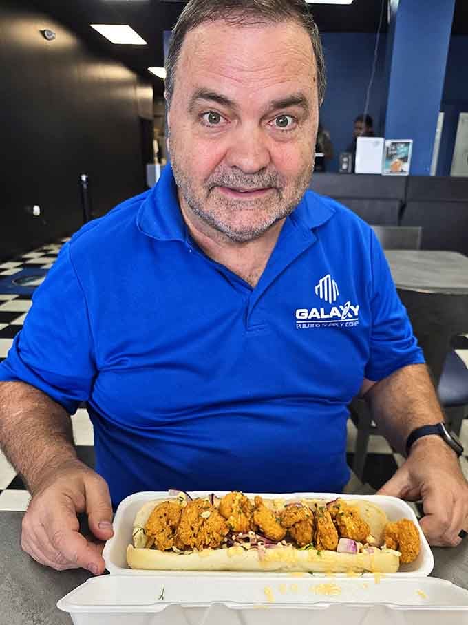 Pure satisfaction captured in one expression, the universal language of discovering a truly great sandwich spot.