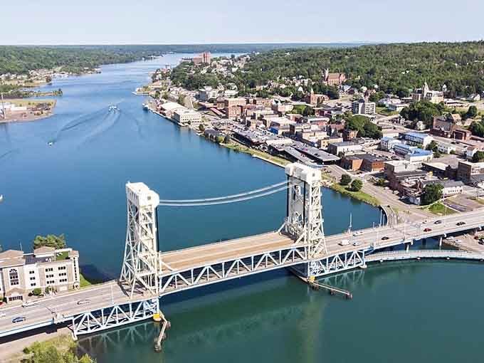 The lift bridge connects Houghton to Hancock, proving that good neighbors build bridges, not walls.