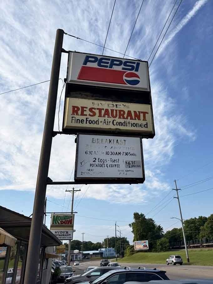 A vintage Pepsi sign advertising fine food and air conditioning, keeping it real since way back when.