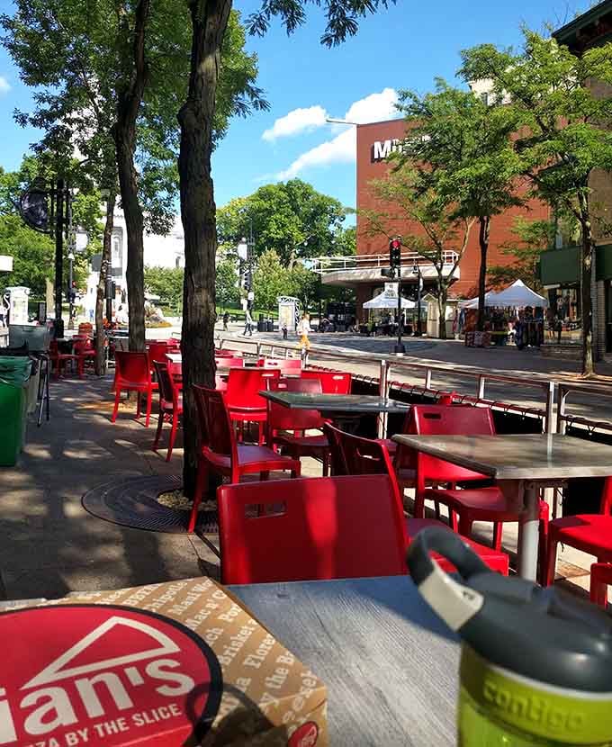 Street-side seating where you can watch Madison go by while contemplating the genius of mac and cheese on pizza.